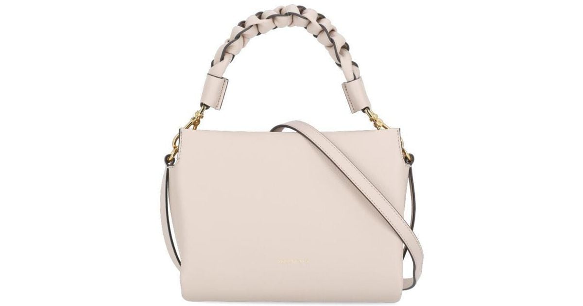 Coccinelle Bags in Natural | Lyst