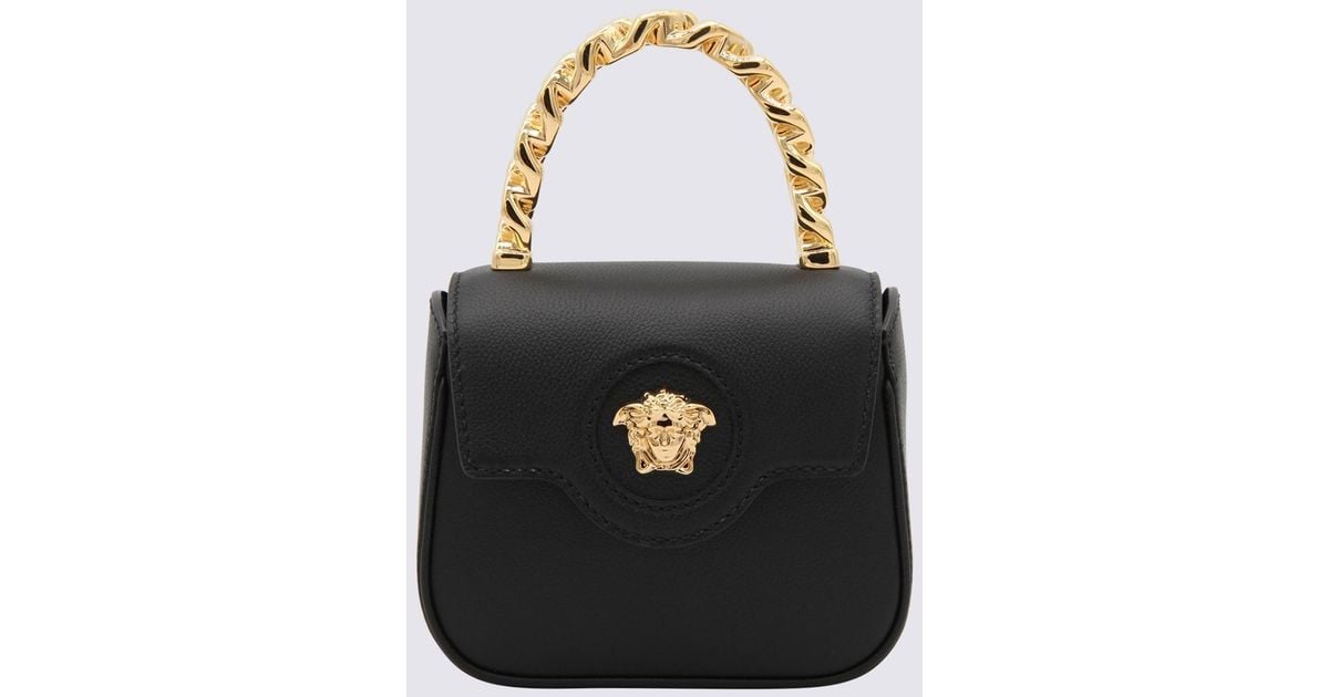 Versace Handbags in Black | Lyst