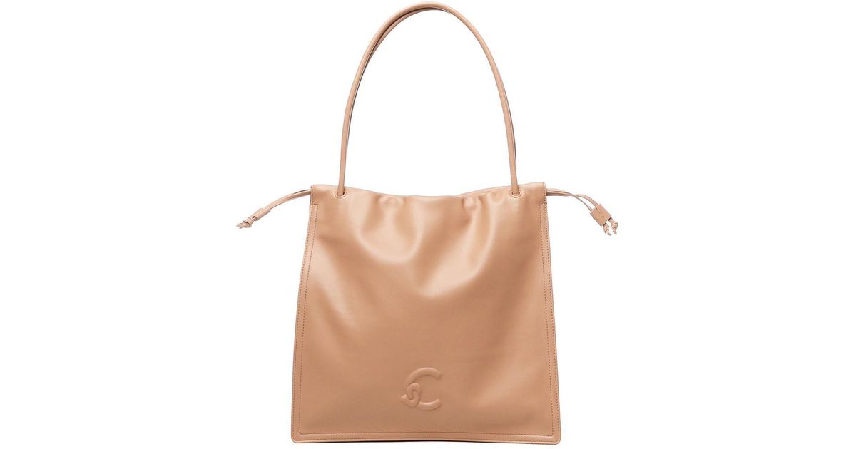 Coccinelle Bags in Natural | Lyst