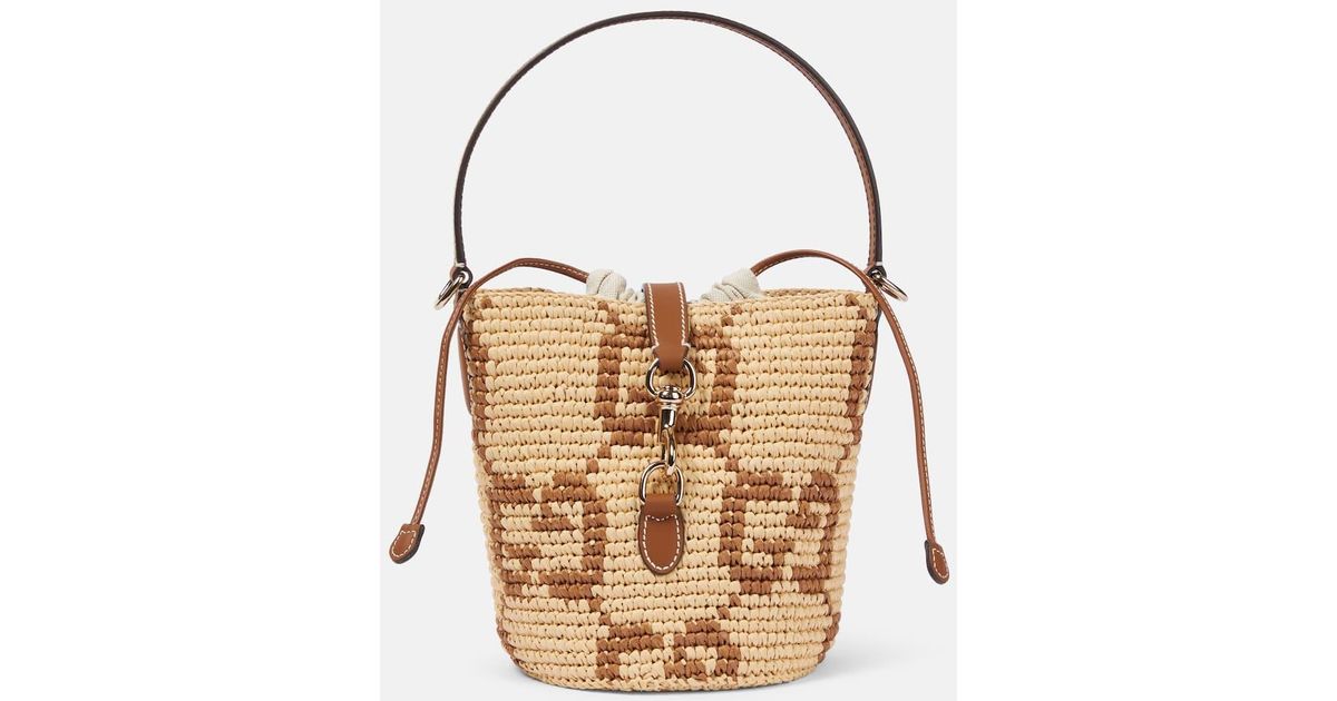 Gucci Gg Mini Raffia-Effect Bucket Bag in Natural | Lyst UK