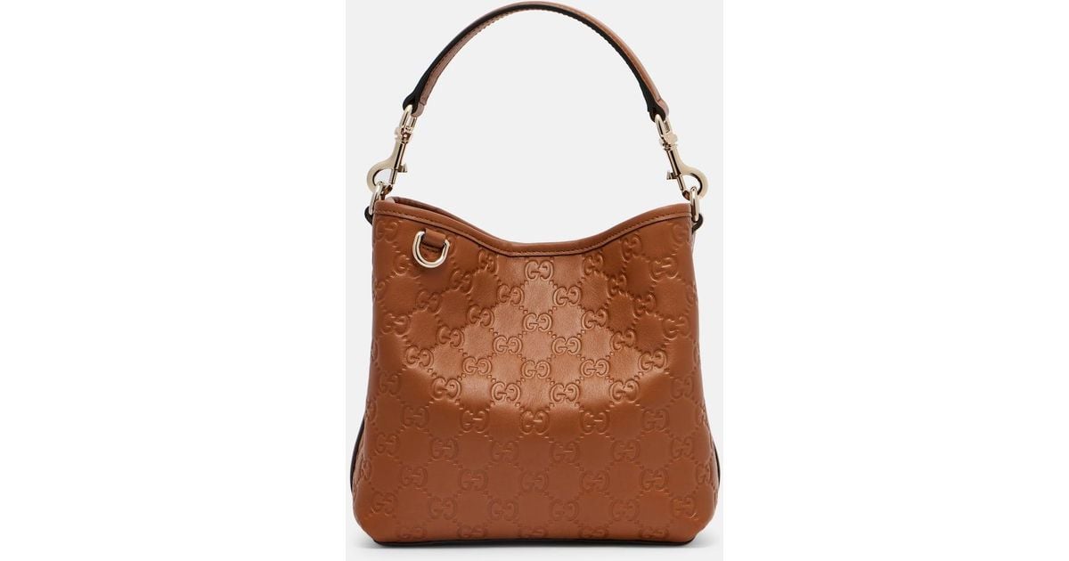 Gucci Gg Emblem Small Leather Bucket Bag in Brown | Lyst