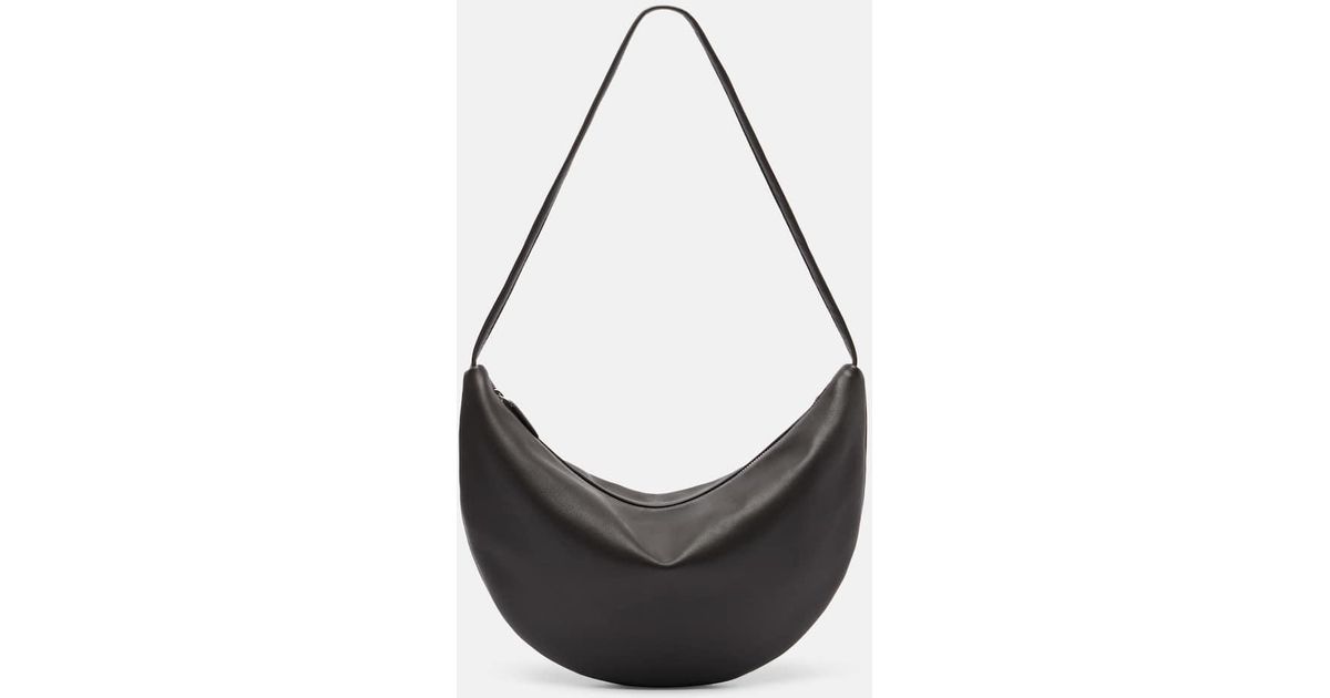 The Row Izzy Small Leather Shoulder Bag in Black | Lyst UK