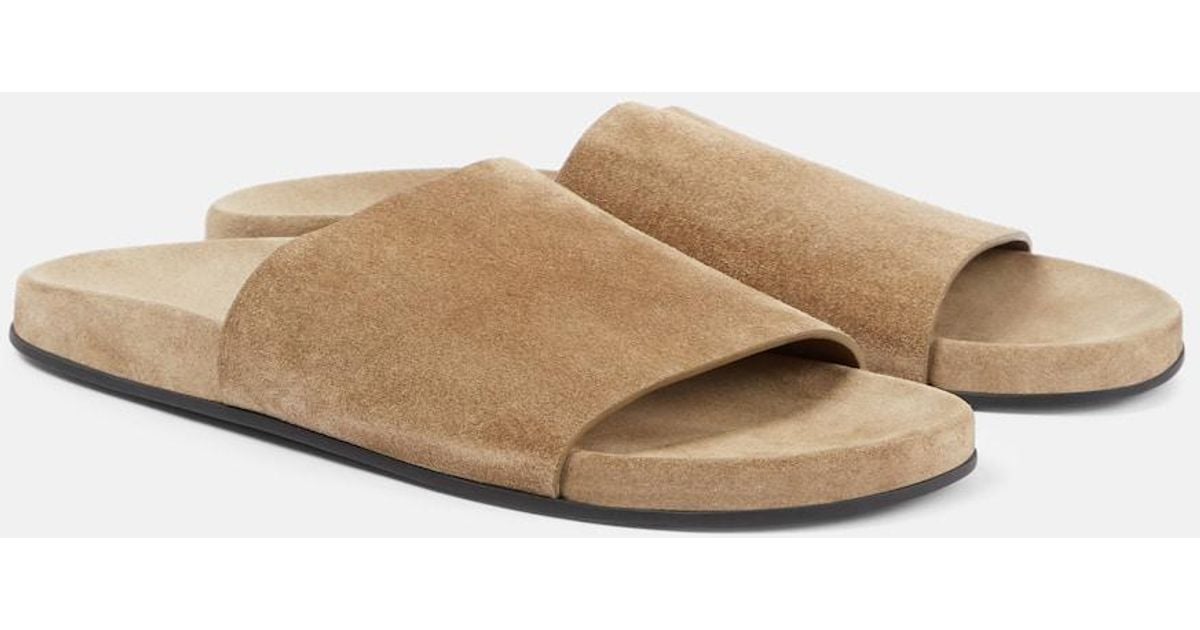 The Row Hugh Suede Slides in Natural | Lyst