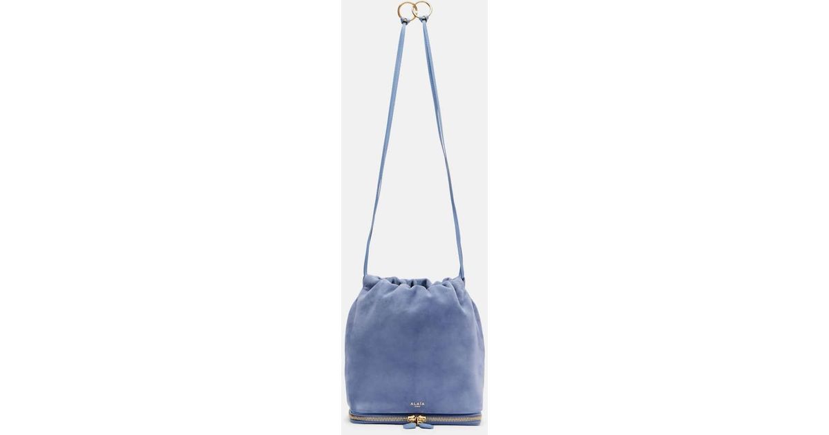 Alaïa Le Pochon Suede Bucket Bag in Blue | Lyst UK