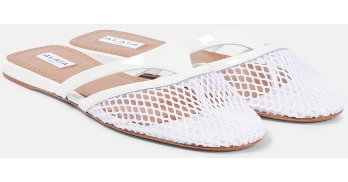 Alaïa Infradito Leather And Fishnet Mules in White | Lyst