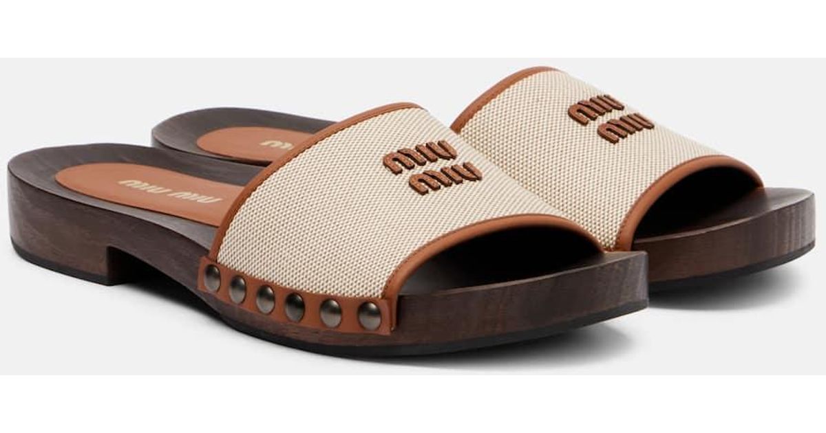 Miu Miu Logo Slides in Brown | Lyst