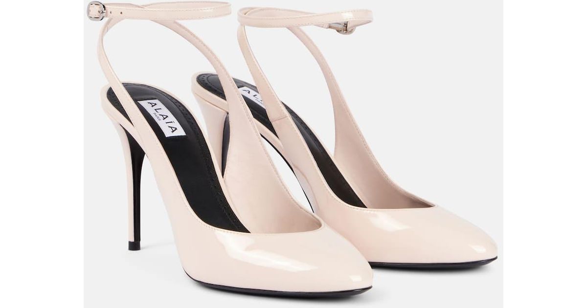 Alaïa Patent Leather Slingback Pumps in White | Lyst