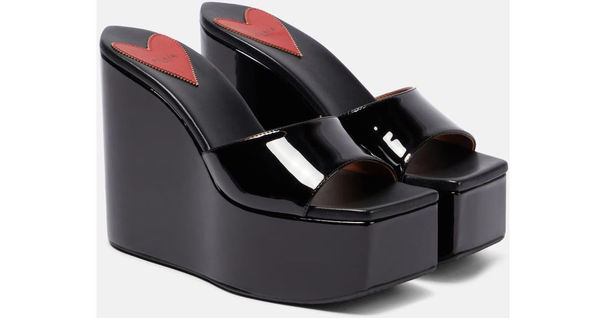Alaïa Patent Leather Platform Wedge Mules in Black | Lyst