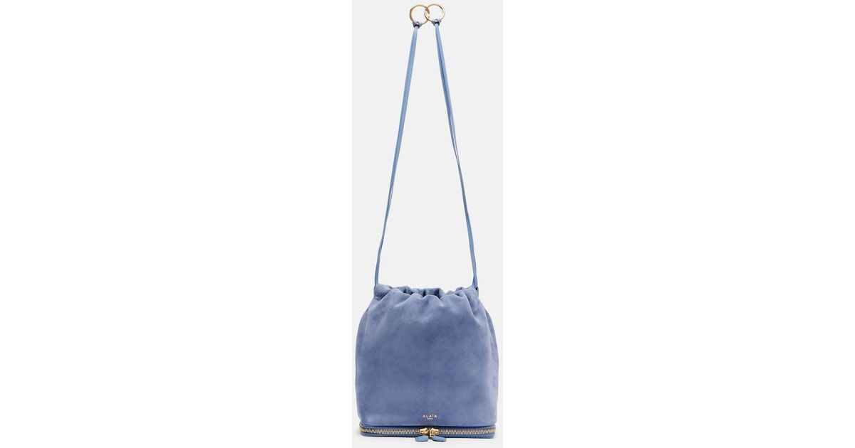 Alaïa Le Pochon Suede Bucket Bag in Blue | Lyst