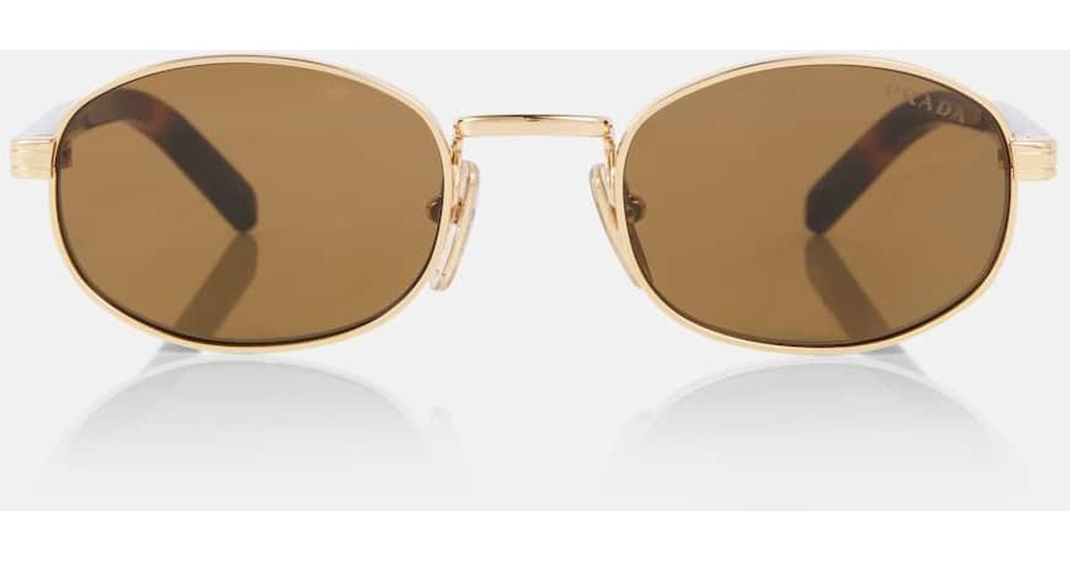 Prada Iconic Plaque Round Sunglasses in Brown | Lyst UK