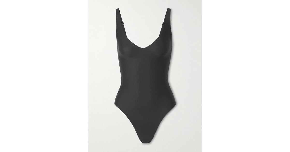 Skims Body Unlined Plunge Thong Bodysuit in Black | Lyst