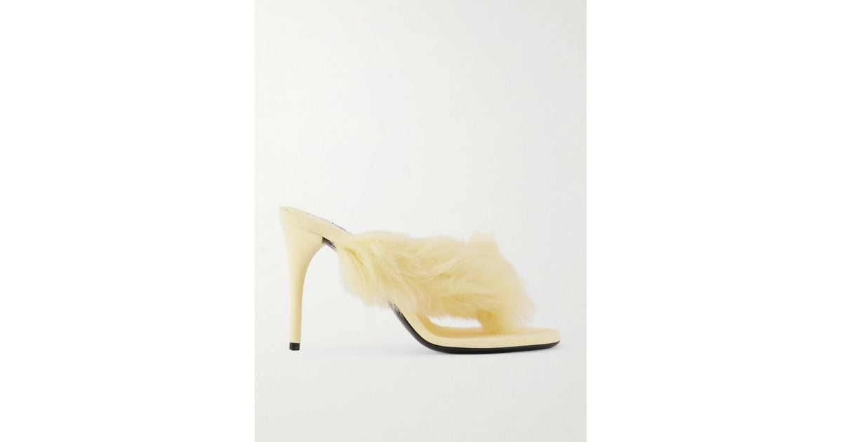 Alaïa Shearling Mules in Yellow | Lyst