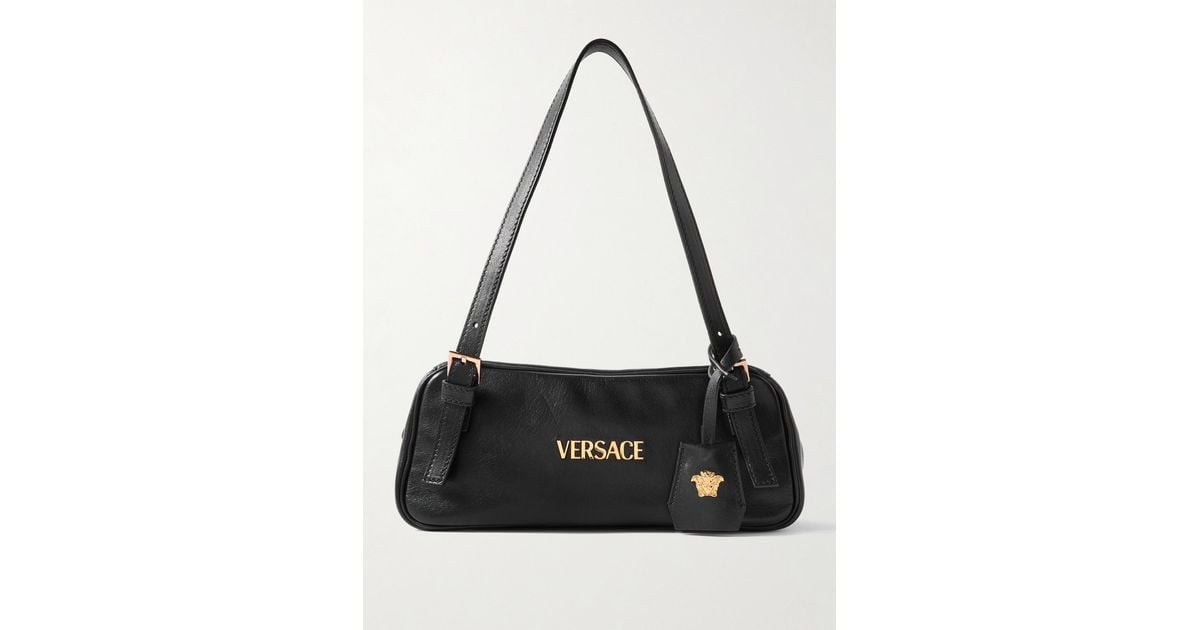 Versace Tag Embellished Leather Shoulder Bag in Black | Lyst