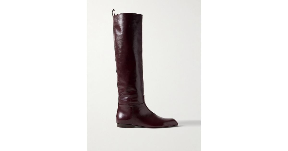 KHAITE Colt Glossed-Leather Knee Boots in Red | Lyst