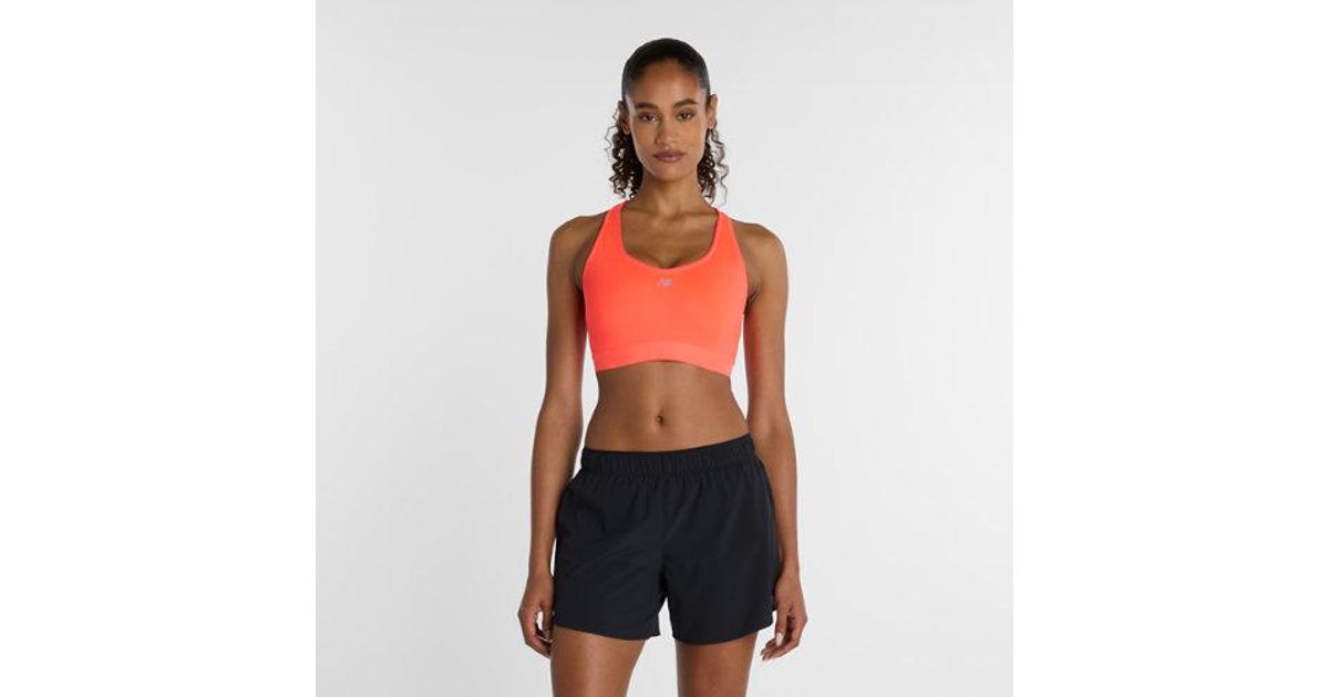 New Balance Nb Essential Run Bra in Red | Lyst