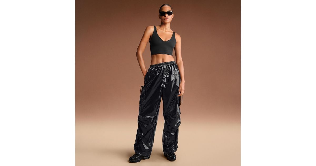 Nike Skims Shiny Nylon Cargo Pants in Blue | Lyst