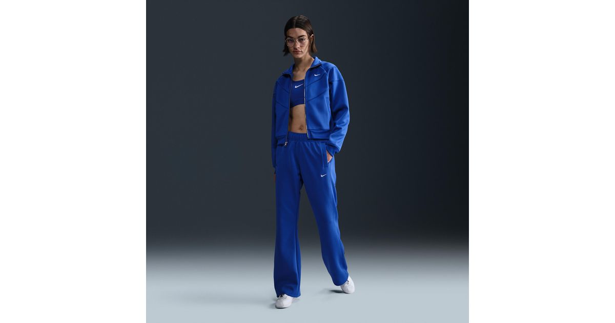 Nike Sportswear Windrunner Mid-Rise Slim Knit Pants in Blue | Lyst