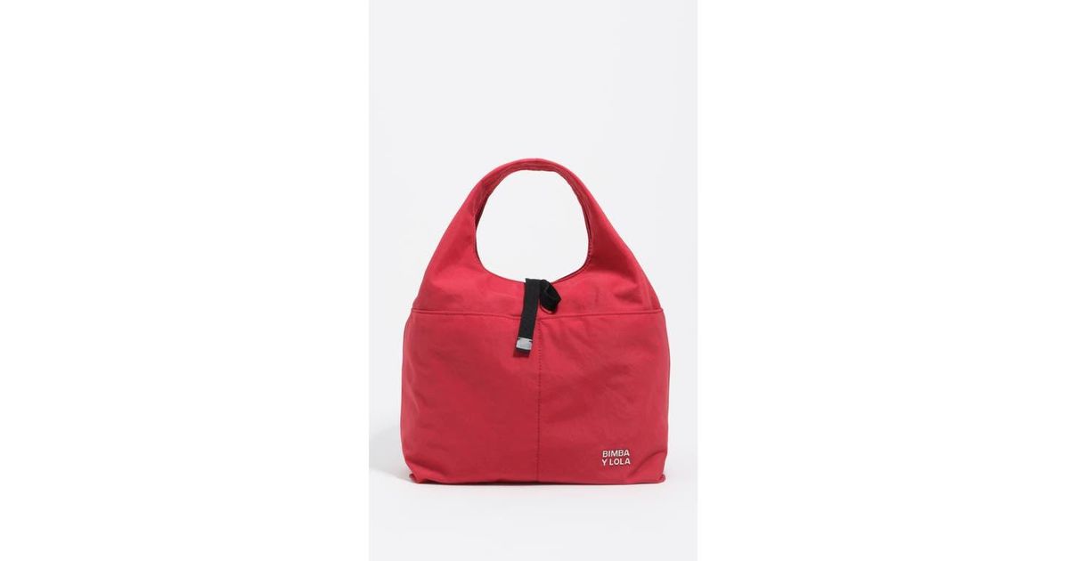 Bimba Y Lola Medium Nylon Paper Bag in Red | Lyst
