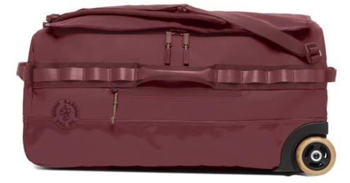 BABOON TO THE MOON Go-Bag Roller Big 55L in Red | Lyst