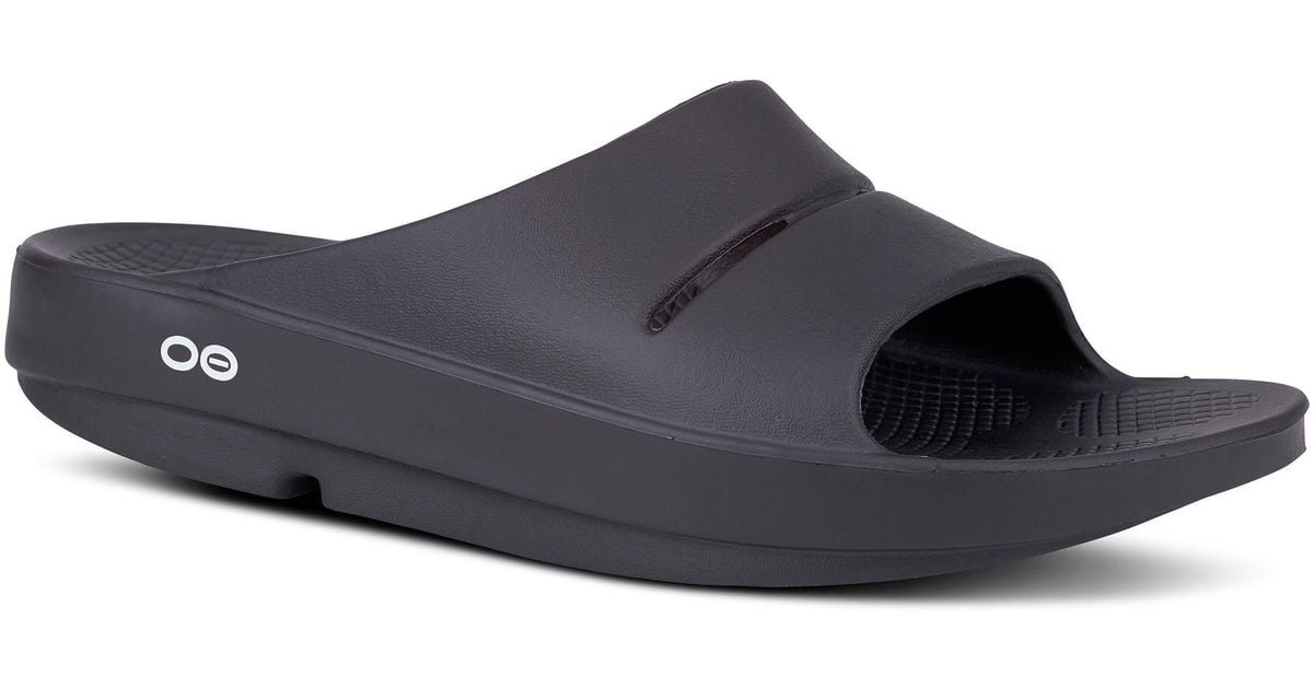 OOFOS Ooahh Slide Sandal in Black | Lyst