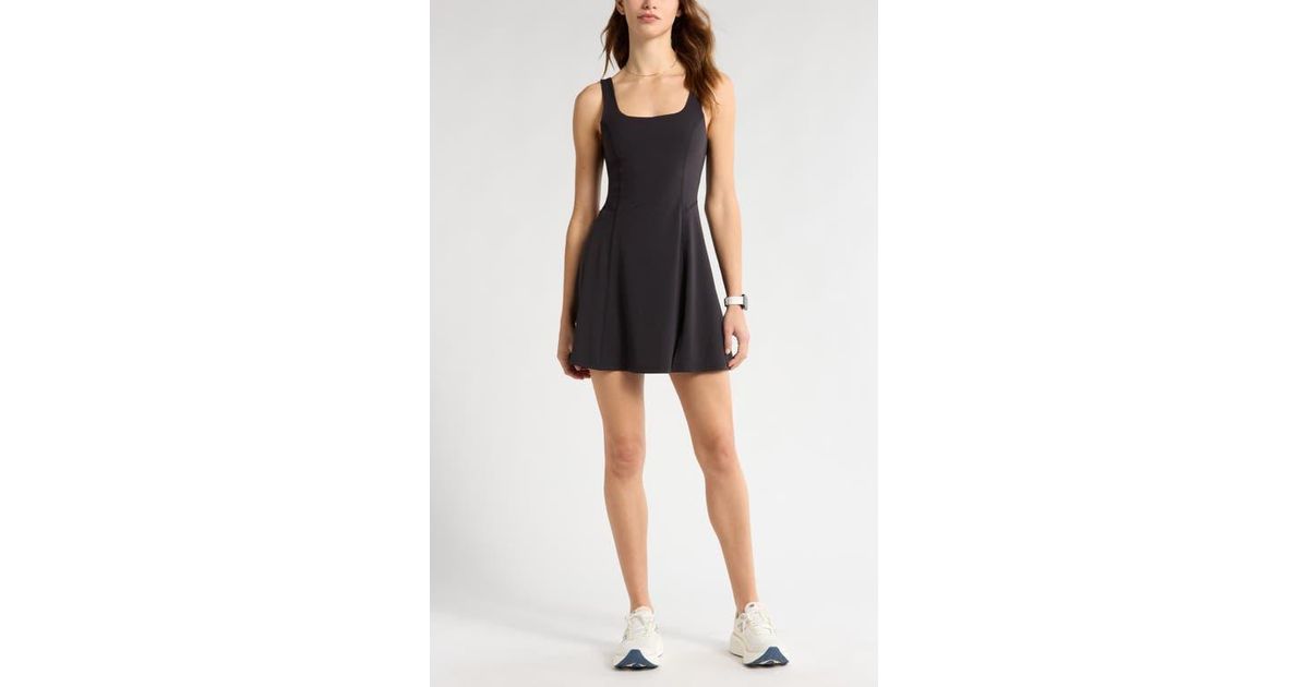Zella Luxe Lite Court Dress With Interior Shorts in Black | Lyst