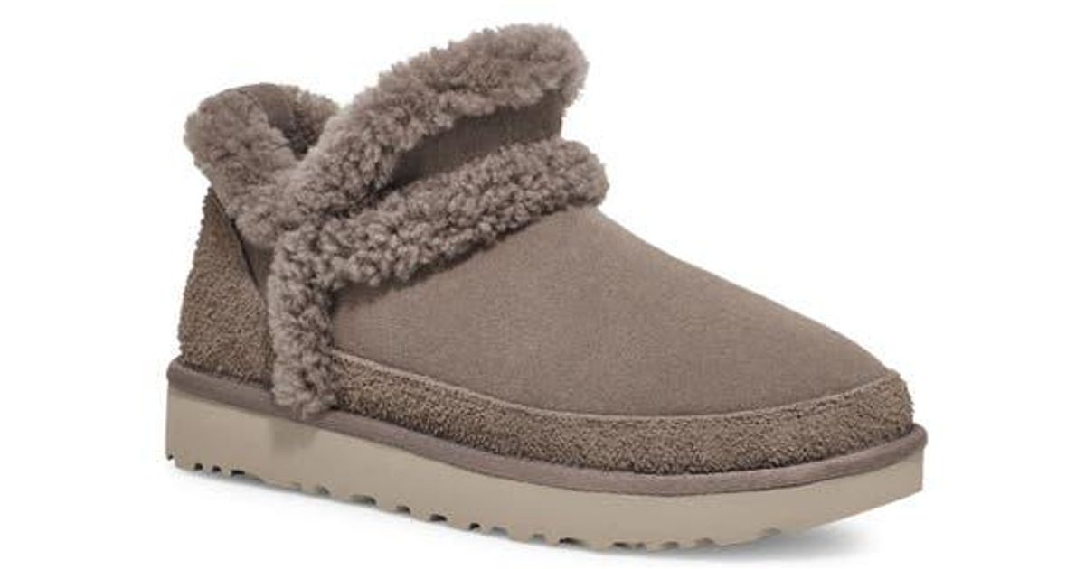 UGG Classic Ultra Mini Spillseam Genuine Shearling Bootie in Brown | Lyst