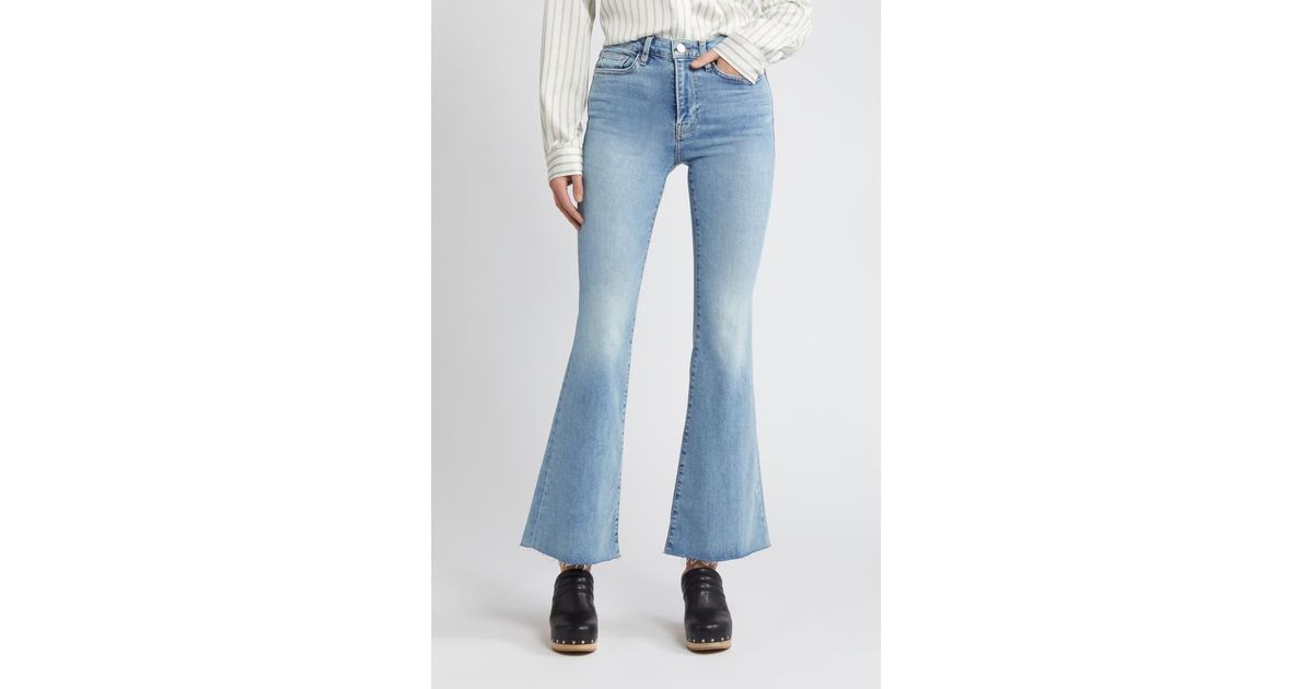FRAME Le Easy Raw Hem Mid Rise Flare Jeans in Blue | Lyst