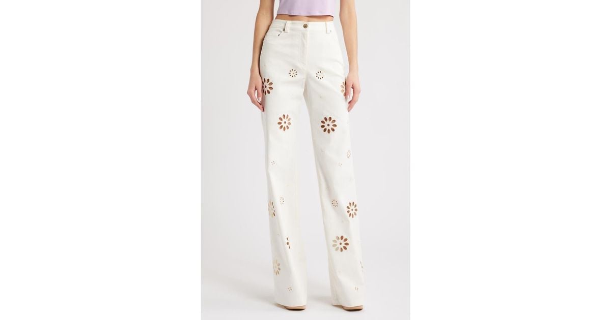 LoveShackFancy Carolette Eyelet Cutout Bootcut Jeans in White | Lyst