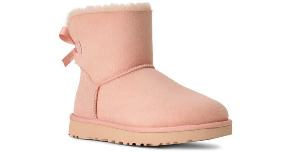 UGG Mini Bailey Bow Ii Genuine Shearling Bootie in Pink | Lyst