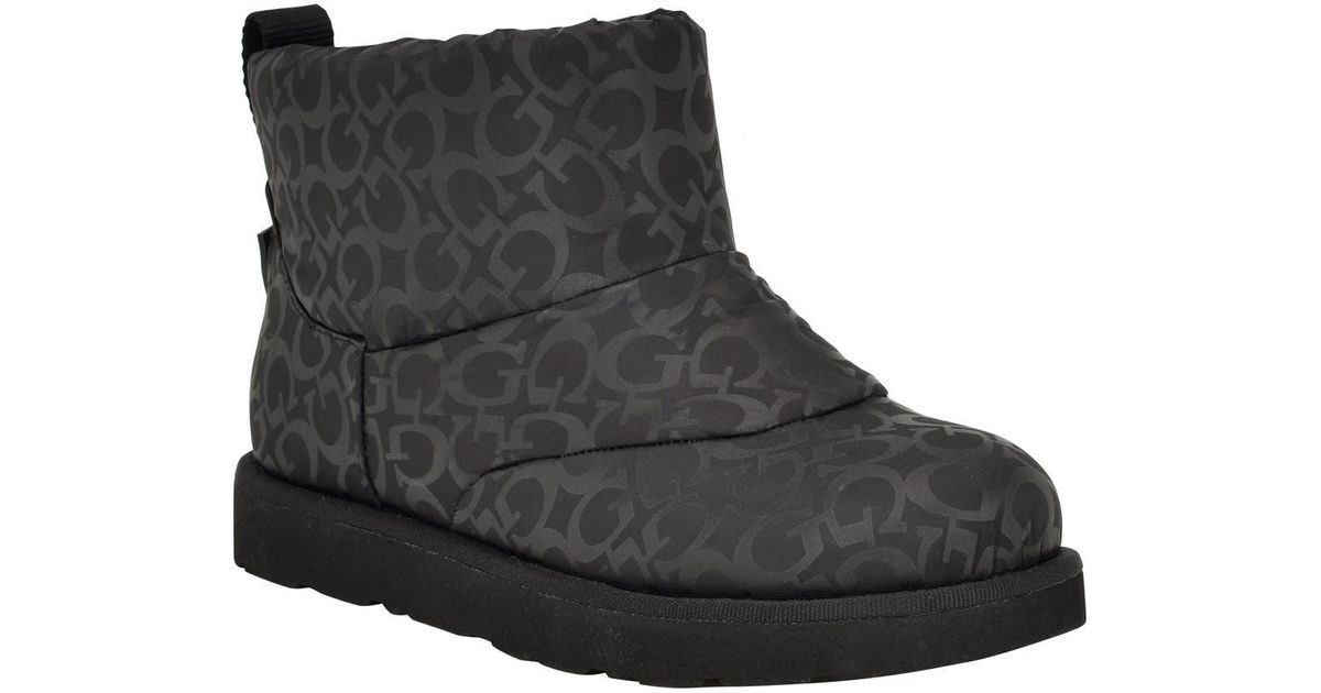 Guess Sashay Quilted Faux Fur Lined Bootie in Black | Lyst