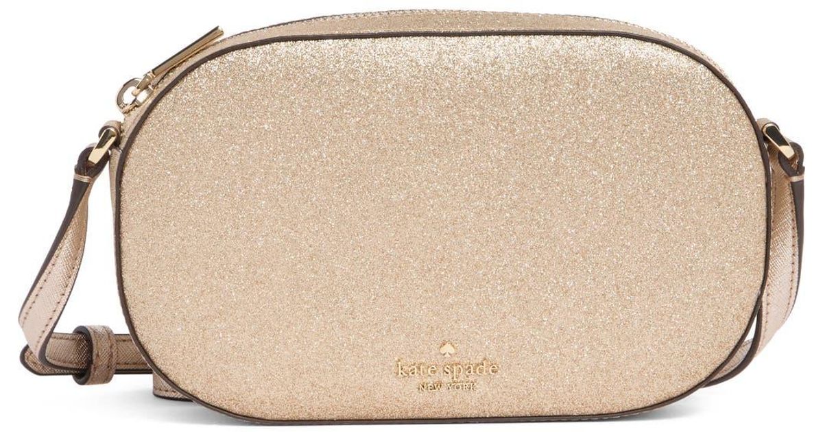 Kate Spade Glimmer Oval Camera Bag in Natural | Lyst