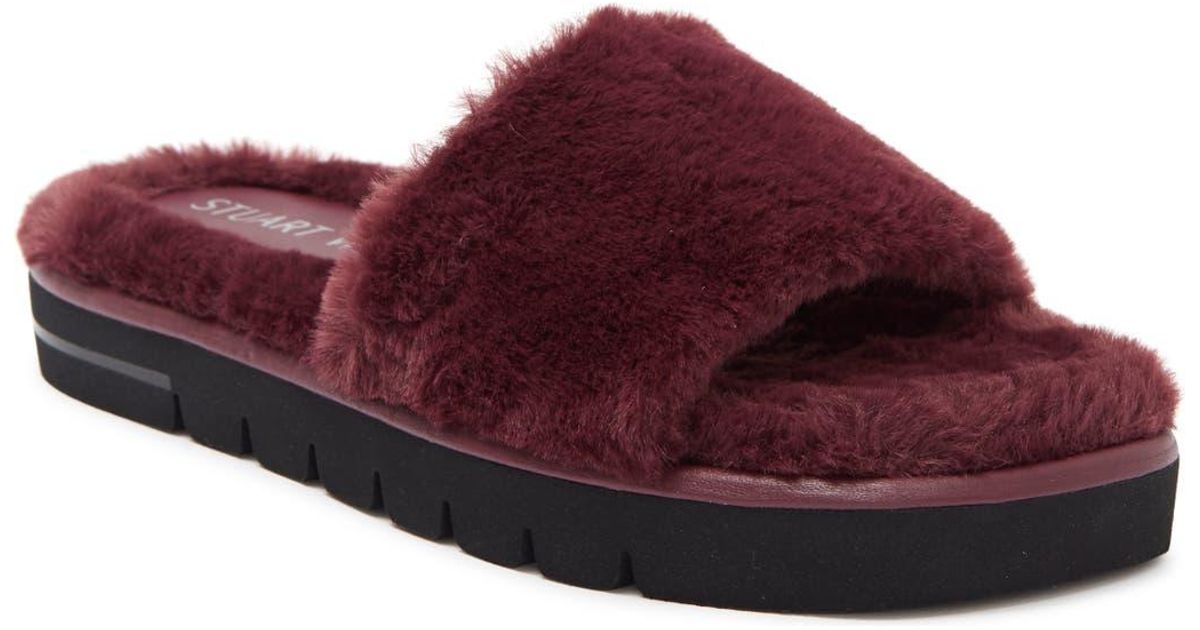 Stuart Weitzman Faux Fur Slide Sandals in Red | Lyst