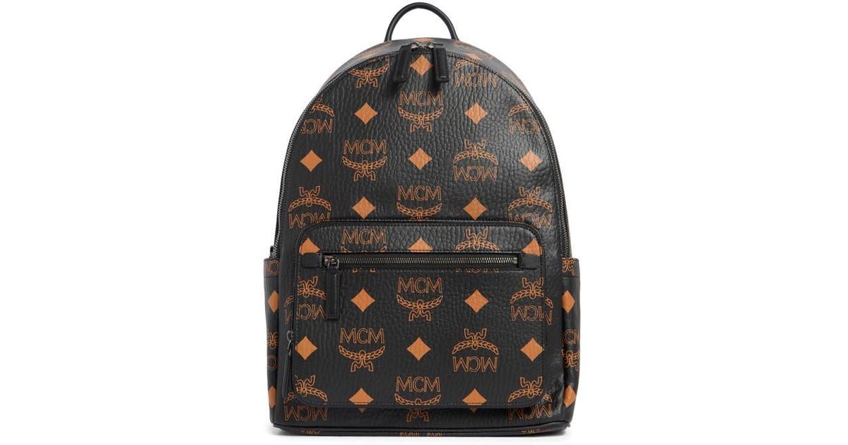 MCM Stark Coated Canvas Monogram Backpack in Black | Lyst