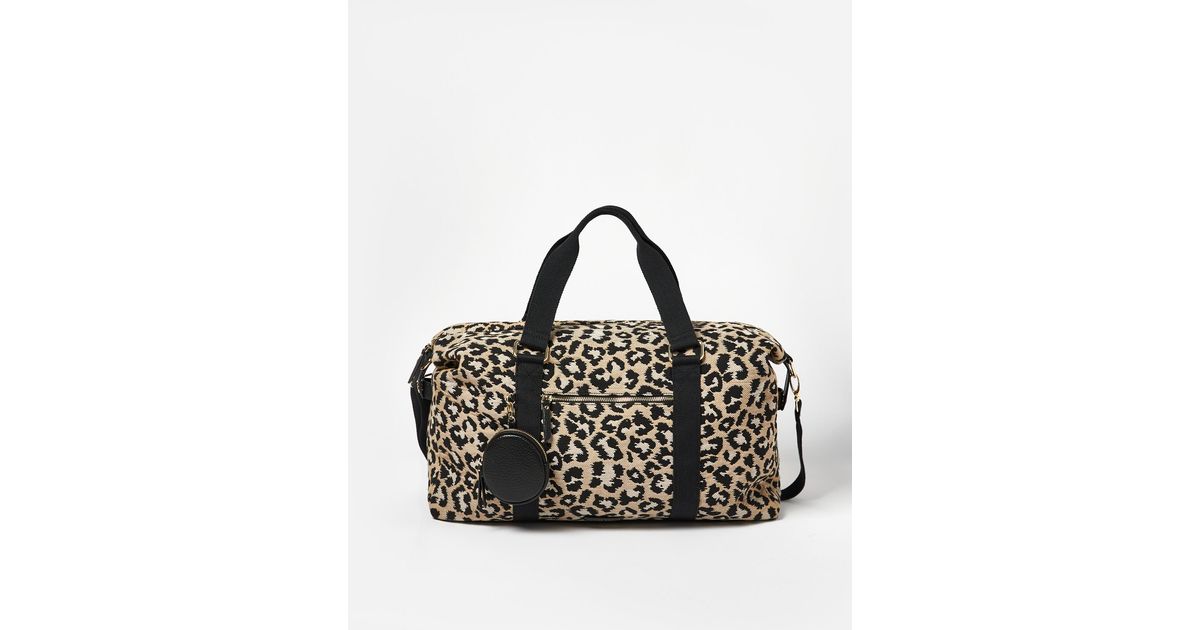 Oliver Bonas Leopard Print Weekend Bag in Black | Lyst UK