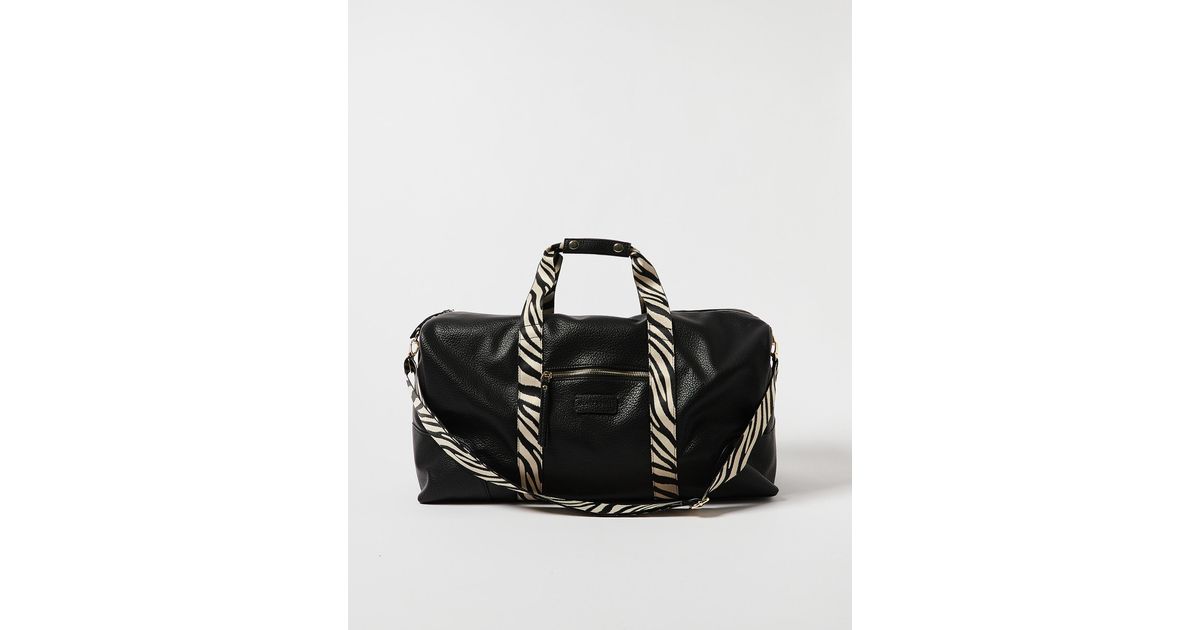 Oliver Bonas Hattie Black Zebra Weekend Bag | Lyst UK