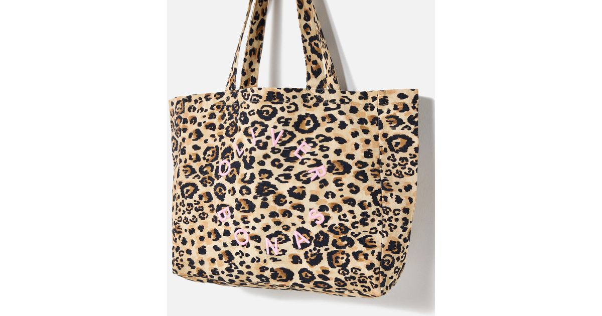 Oliver Bonas Leopard Print Logo Fabric Tote Shopper Bag in Metallic ...