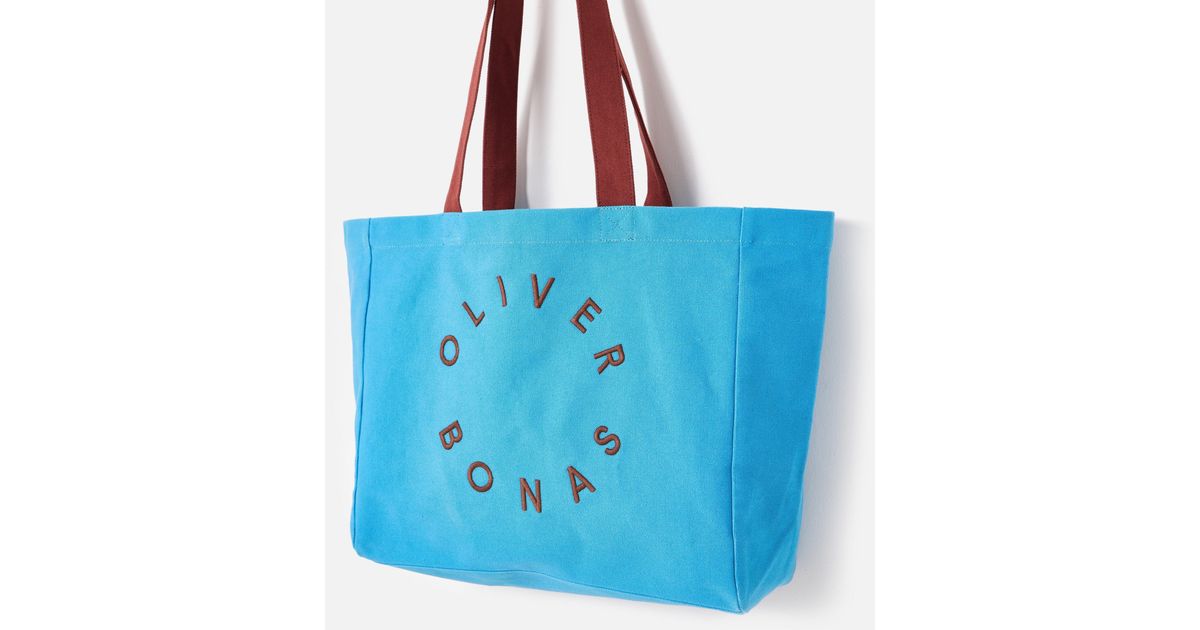 Oliver Bonas & Chocolate Brown Logo Fabric Tote Shopper Bag in Blue ...