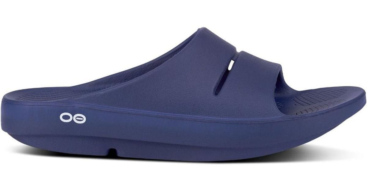 OOFOS Slide Sandals in Blue | Lyst