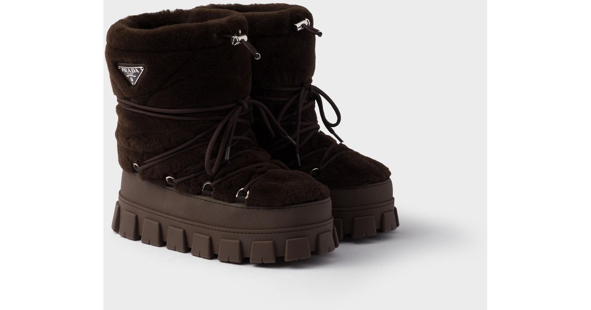 Prada Shearling Après Ski Booties in Black | Lyst