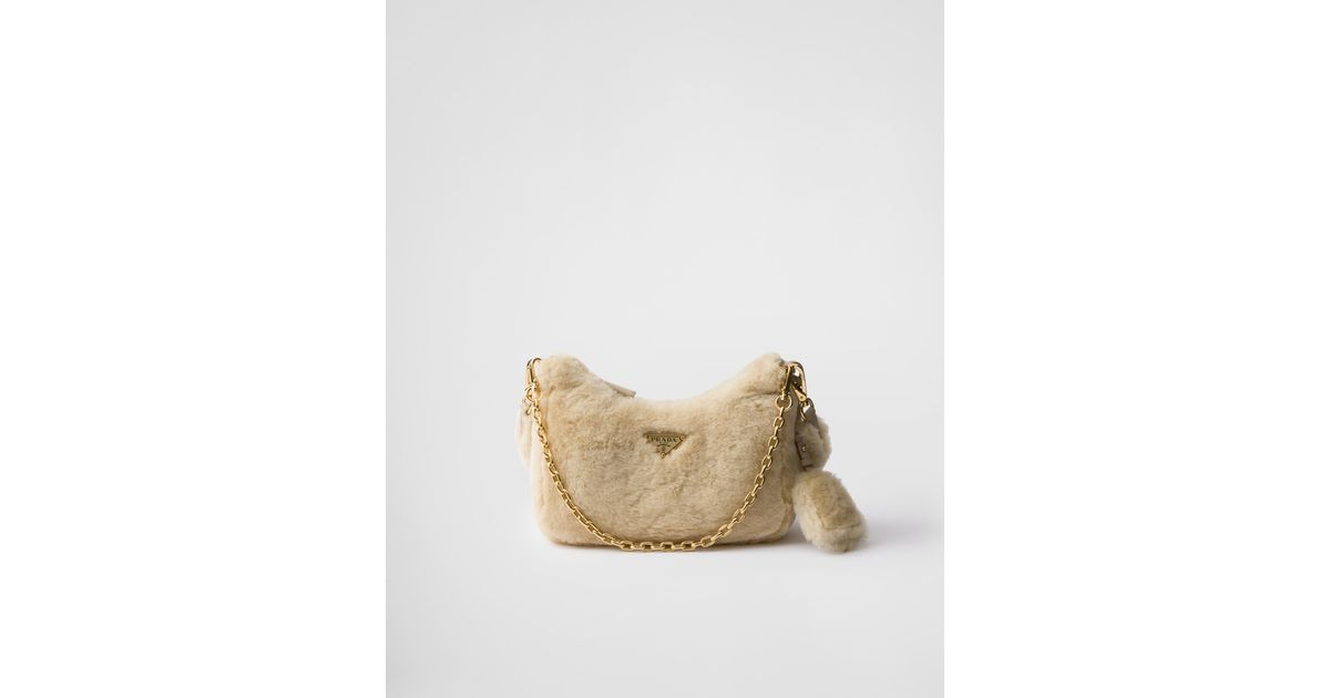 Prada Re-Edition Shearling Mini-Bag in Natural | Lyst