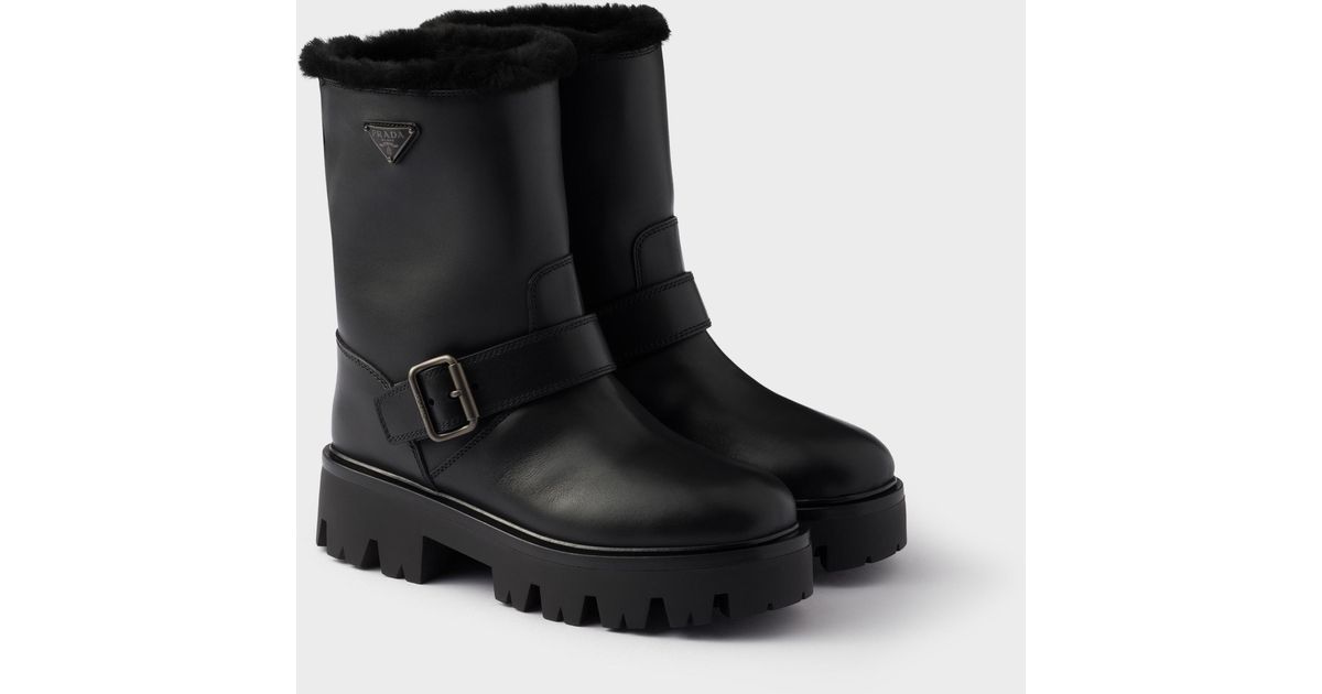 Prada Leather And Shearling Booties in Black | Lyst