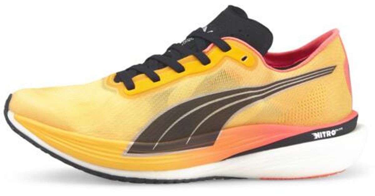PUMA Deviate Nitroâ Elite 2 Fireglow Running Shoes in Yellow | Lyst