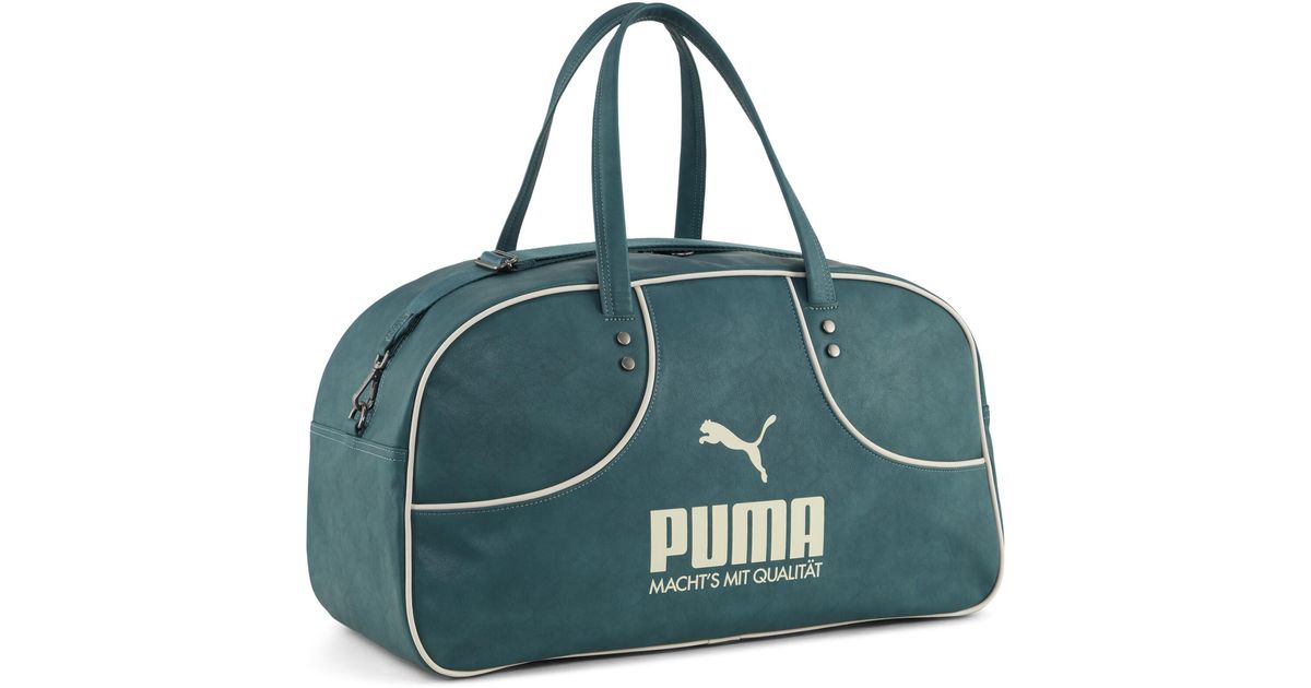 PUMA 1976 Archive 30L Grip Bag in Green | Lyst
