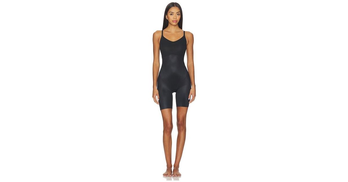 Spanx Shape Invisible Shaping Closed Bust Mid-Thigh Bodysuit in Blue | Lyst