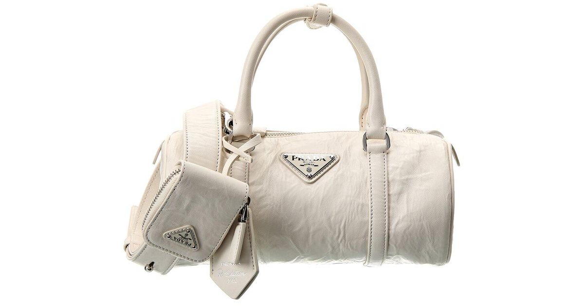 Prada Re-edition 2002 Logo Leather Roll Bag in Natural | Lyst UK