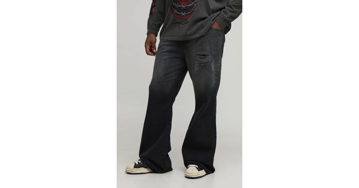 BoohooMAN Plus Ripped Let Down Hem Rigid Flared Jeans in Black for Men ...