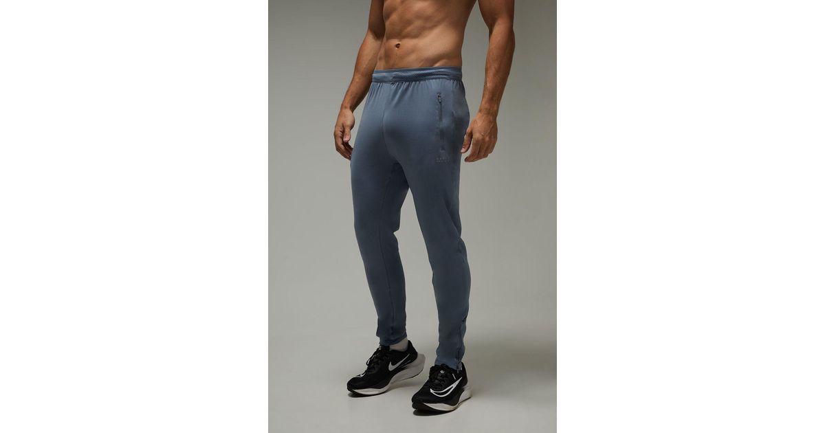 BoohooMAN Active Gym Essentials Stretch Tapered Jogger in Blue for Men ...