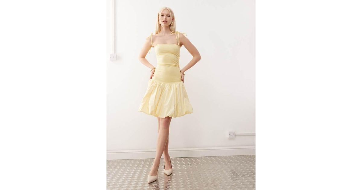Amy Lynn Alexa Tie Shoulder Puffball Mini Dress in Natural | Lyst UK