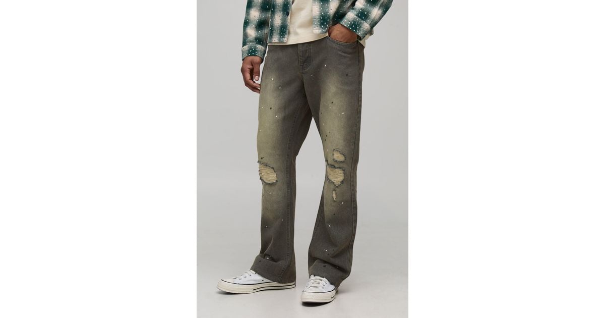 BoohooMAN Slim Flared Knee Rip And Repair Paint Splatter Jeans in Green ...
