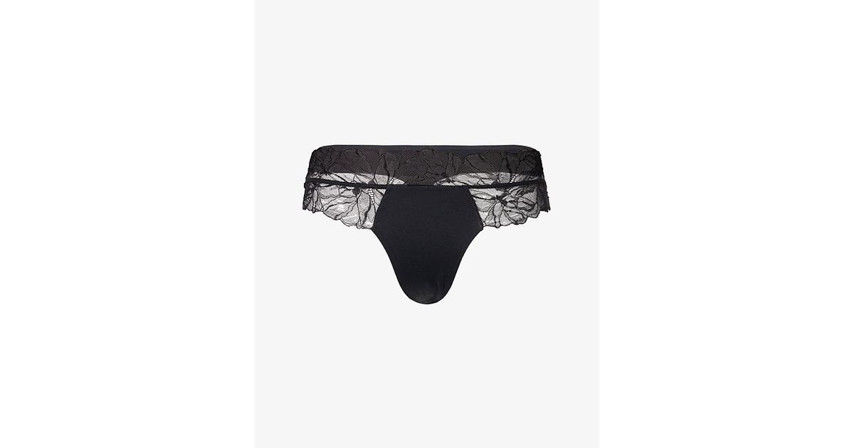 Calvin Klein Perfectly Fit Lace Stretch-Woven Thong in Black | Lyst UK